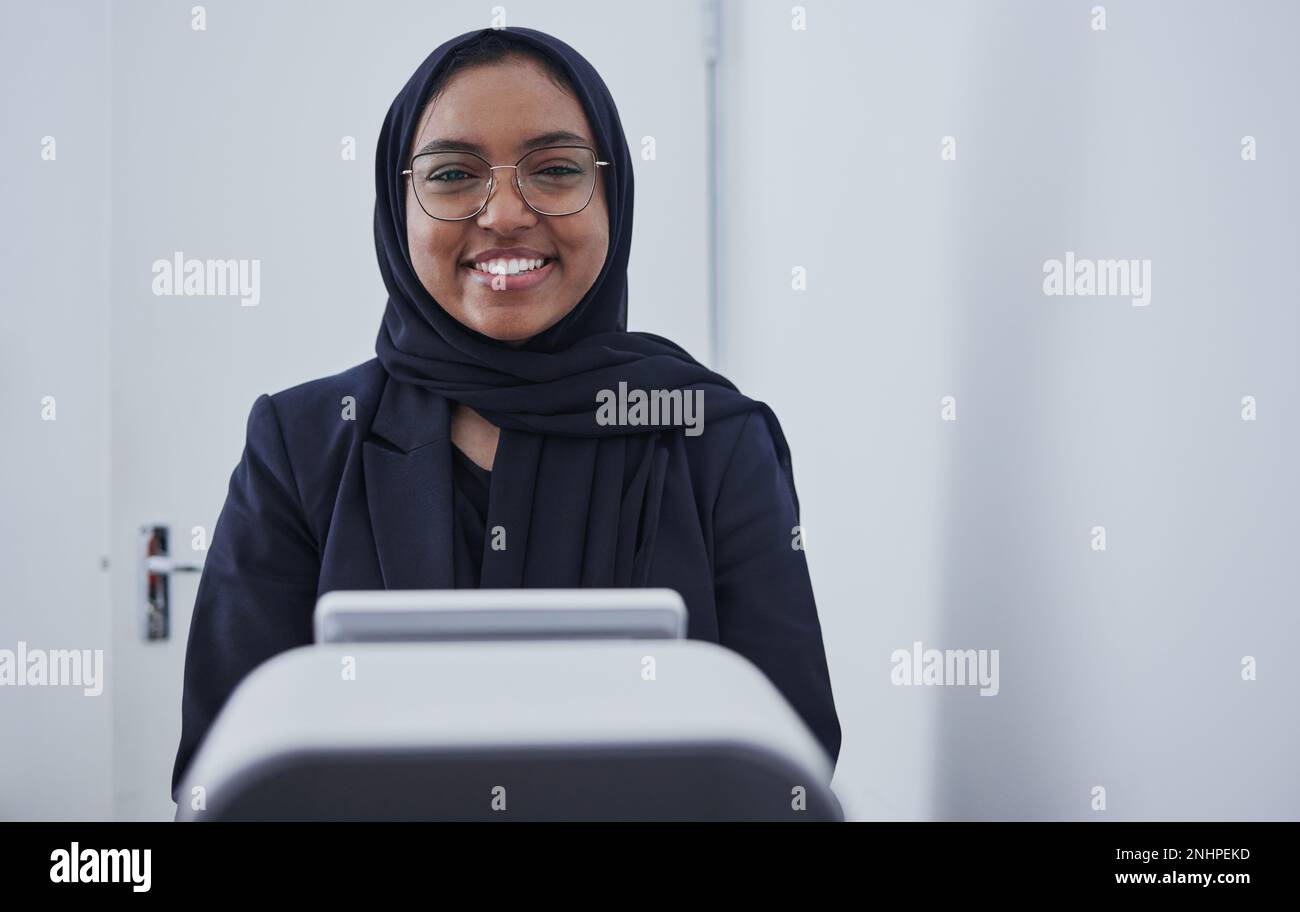 Optometry, smile and portrait of a Muslim woman with a machine for a ...