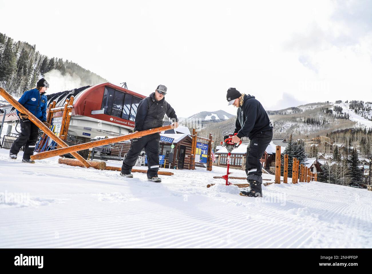 Brock Terry with Beaver Creek Lift Operations augers holes into the ...