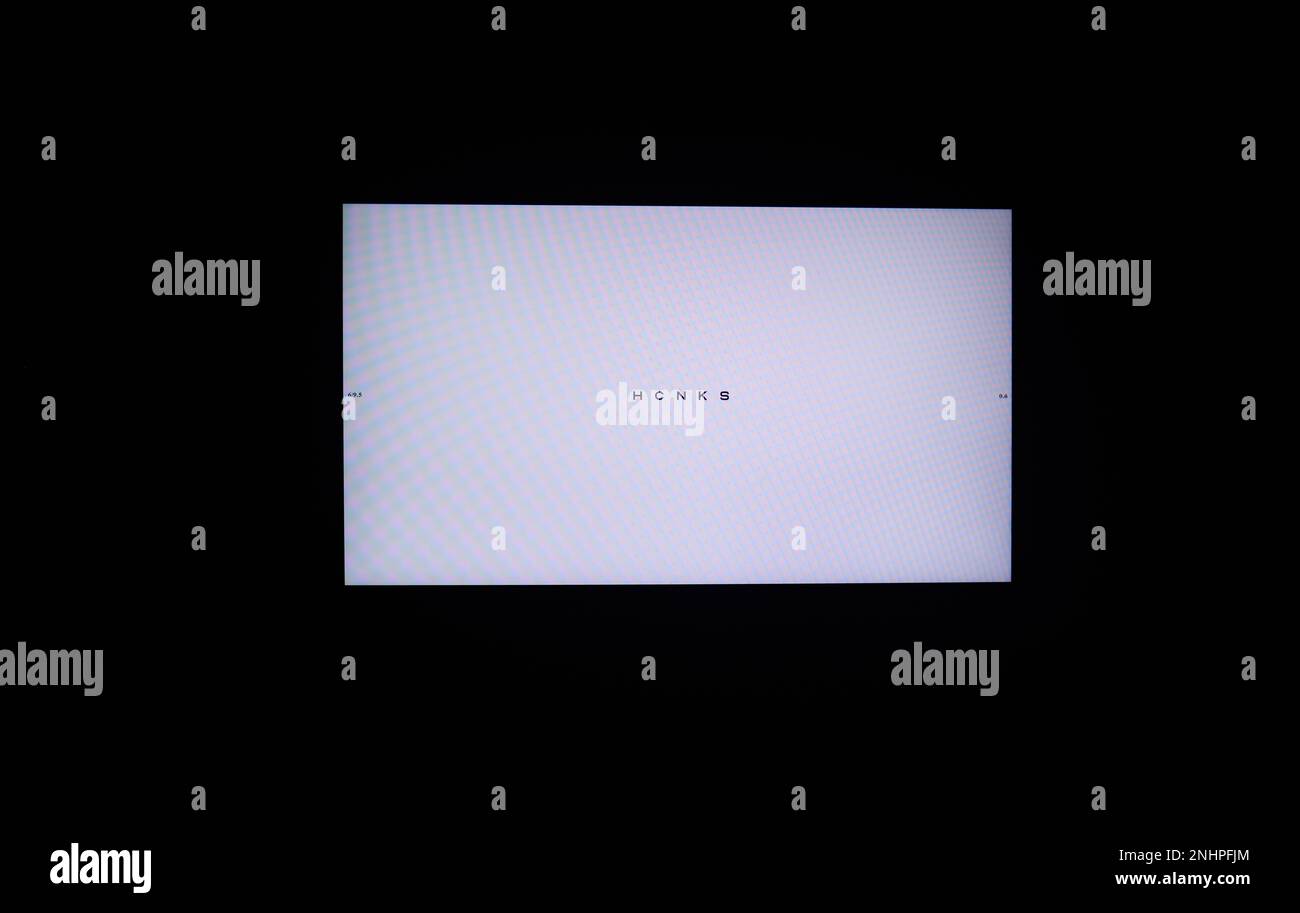 Optometry, screen and dark room with a vision test, letters and ...