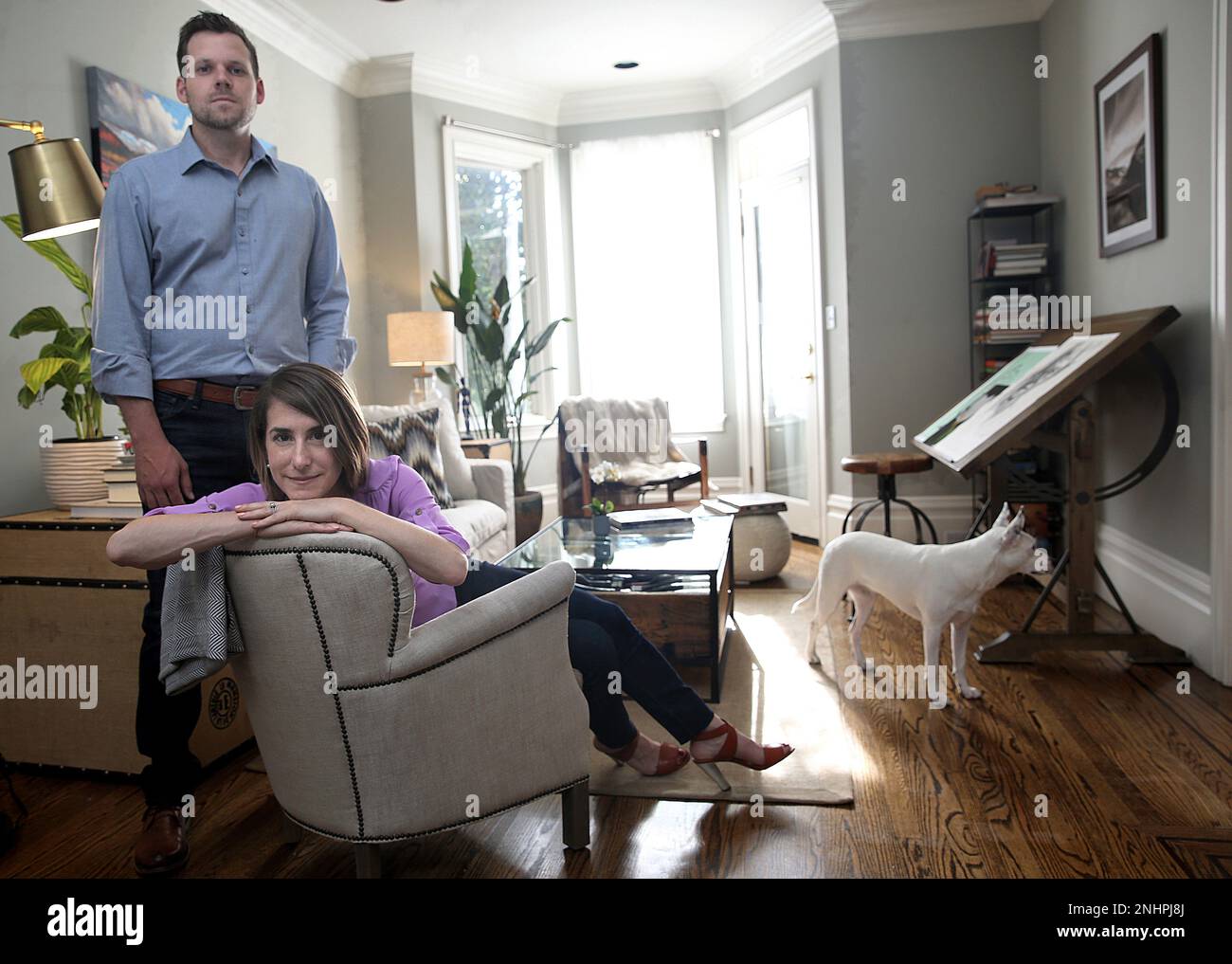Modsy CEO and founder Shanna Tellerman (seated) with her husband and ...