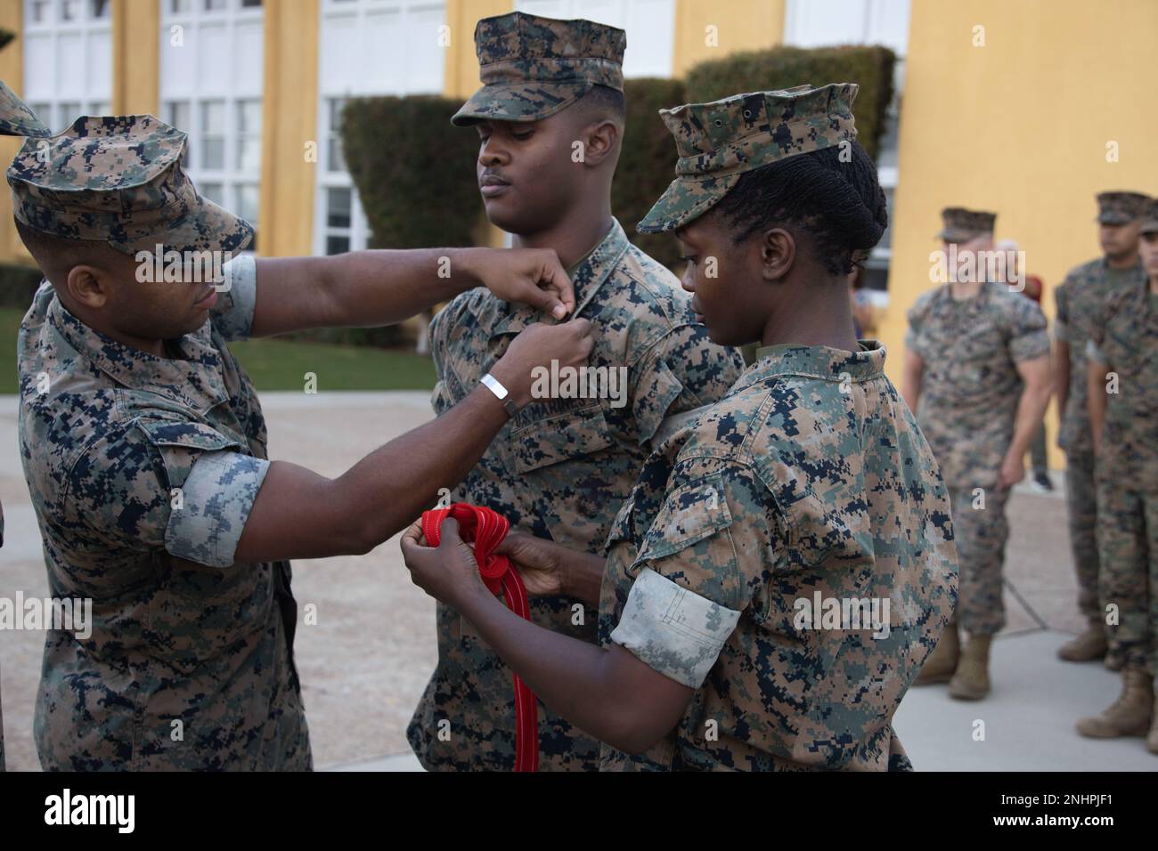 U.S. Marine Corps Gunnery Sgt. Fredricka Marin, right, and Sgt. Rashod ...