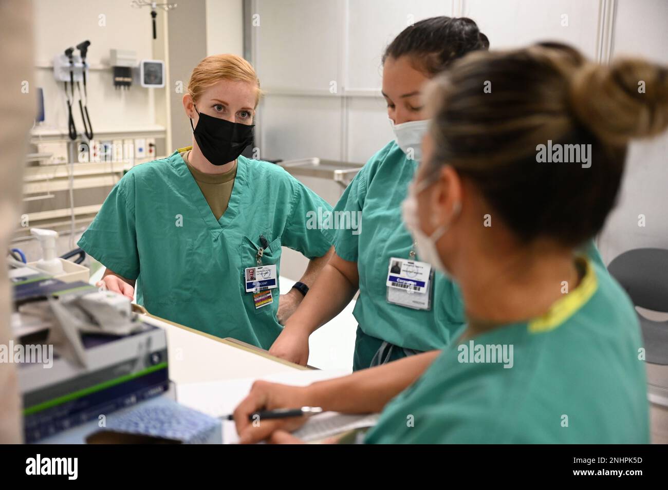 Staff Sgt. Stacey Miller and Master Sgt. Jackie Carlisle, medics with ...
