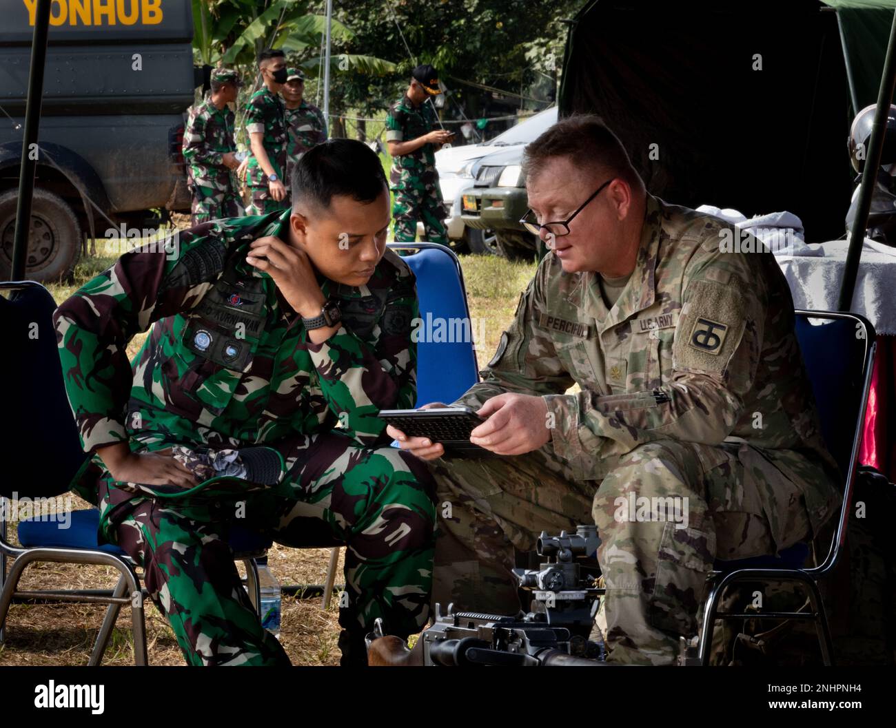 Maj. Stephen Perciful, 90th Sustainment Brigade, prepares a speech with ...