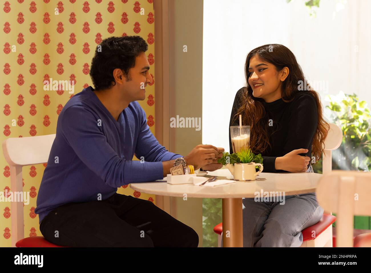 Three persons talking hi-res stock photography and images - Alamy