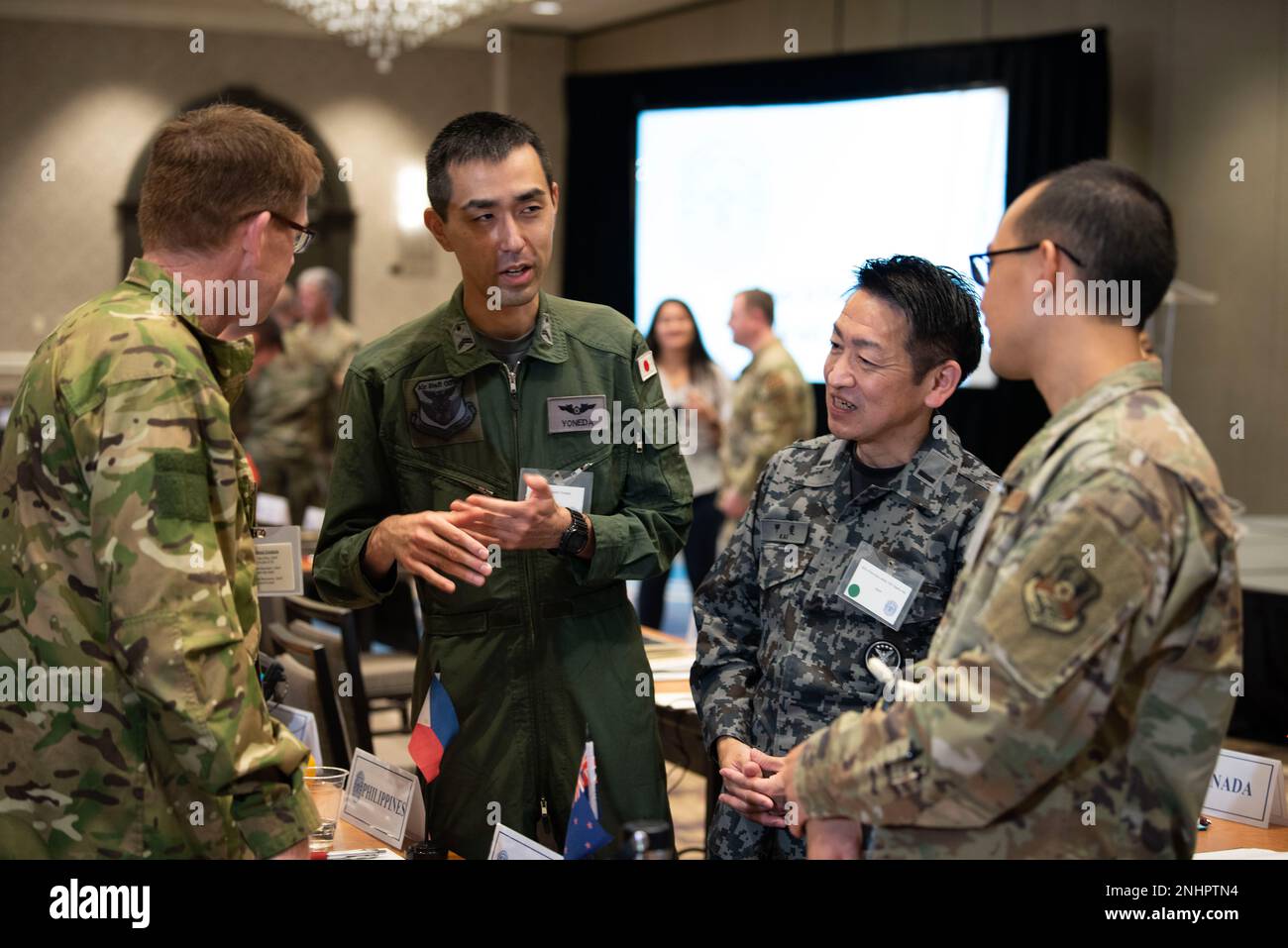 Warrant Officer of the New Zealand Air Force Kerry Williams speaks with ...