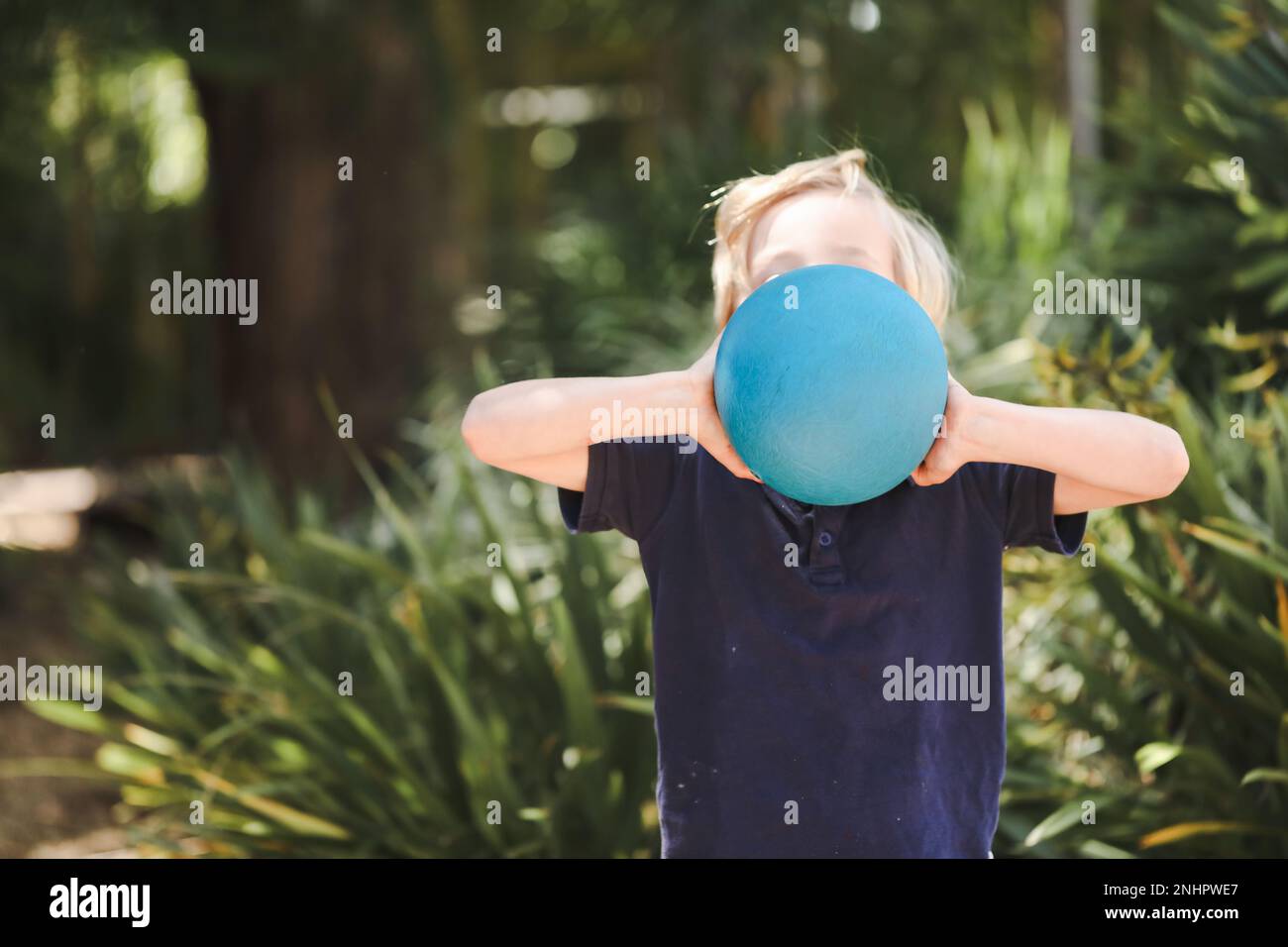 Children playing throw and catch ball hi-res stock photography and ...