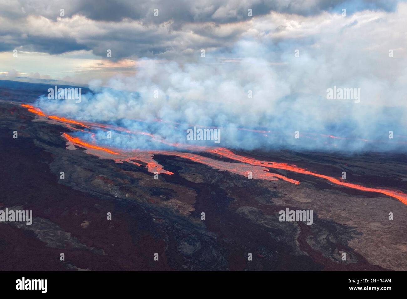 In this aerial photo released by the U.S. Geological Survey, the Mauna Loa volcano is seen ...