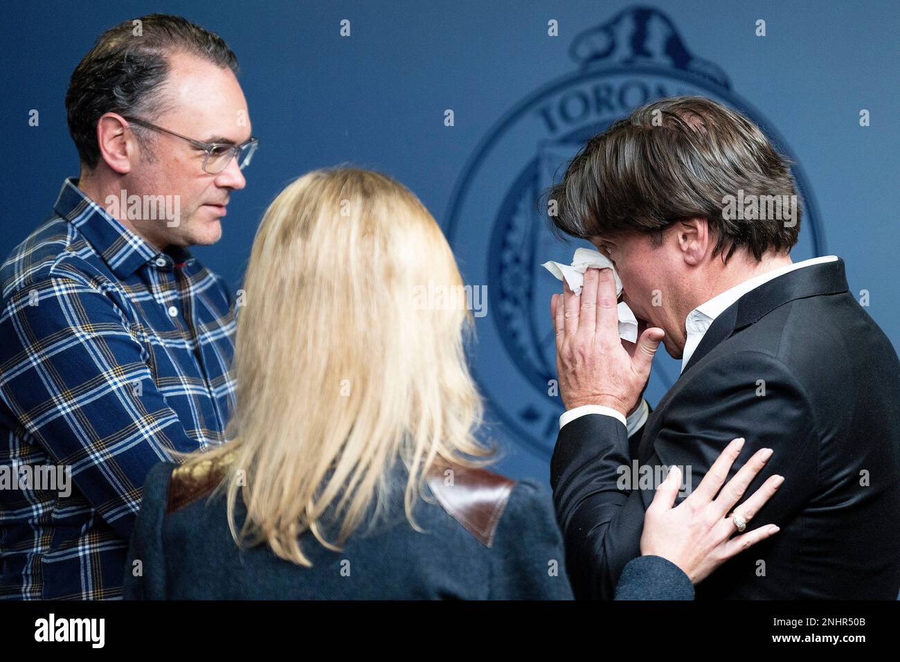 Sean McCowan, right, reacts as he stands with Kaelin McCowan, brothers ...
