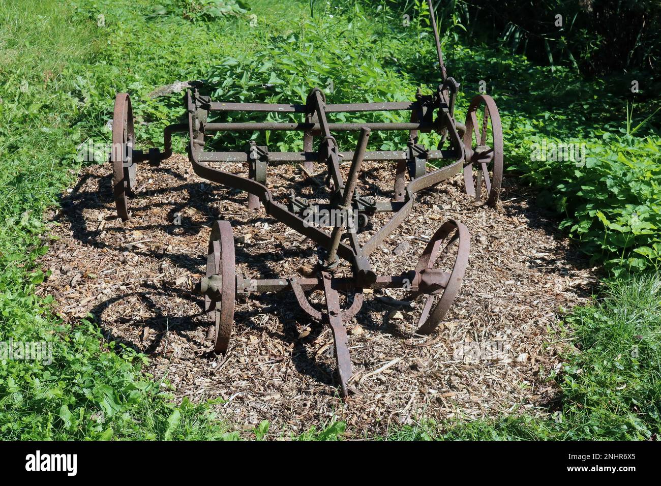 Old broken rusty plow in the backyard of a village house Stock Photo ...