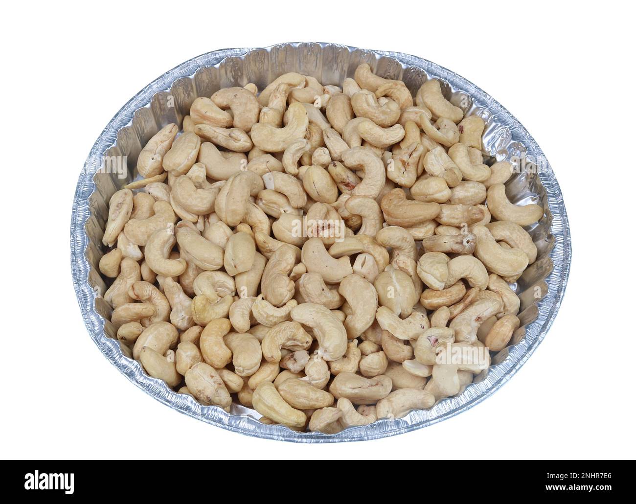 Peeled cashew nuts in a plastic box . Isolated on white Stock Photo - Alamy