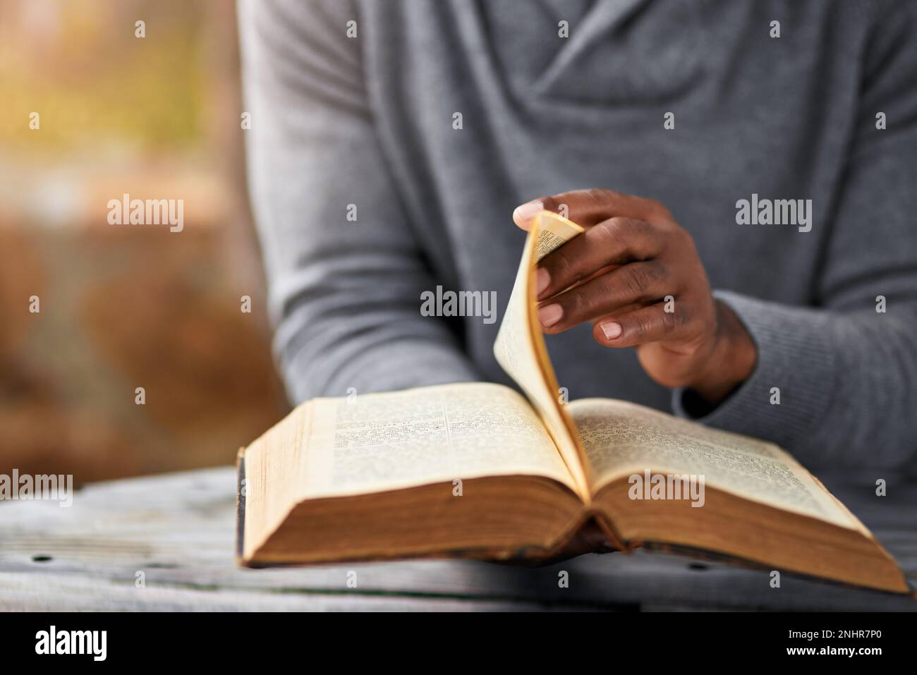 The bible is full of knowledge. an unrecognizable man reading his bible ...