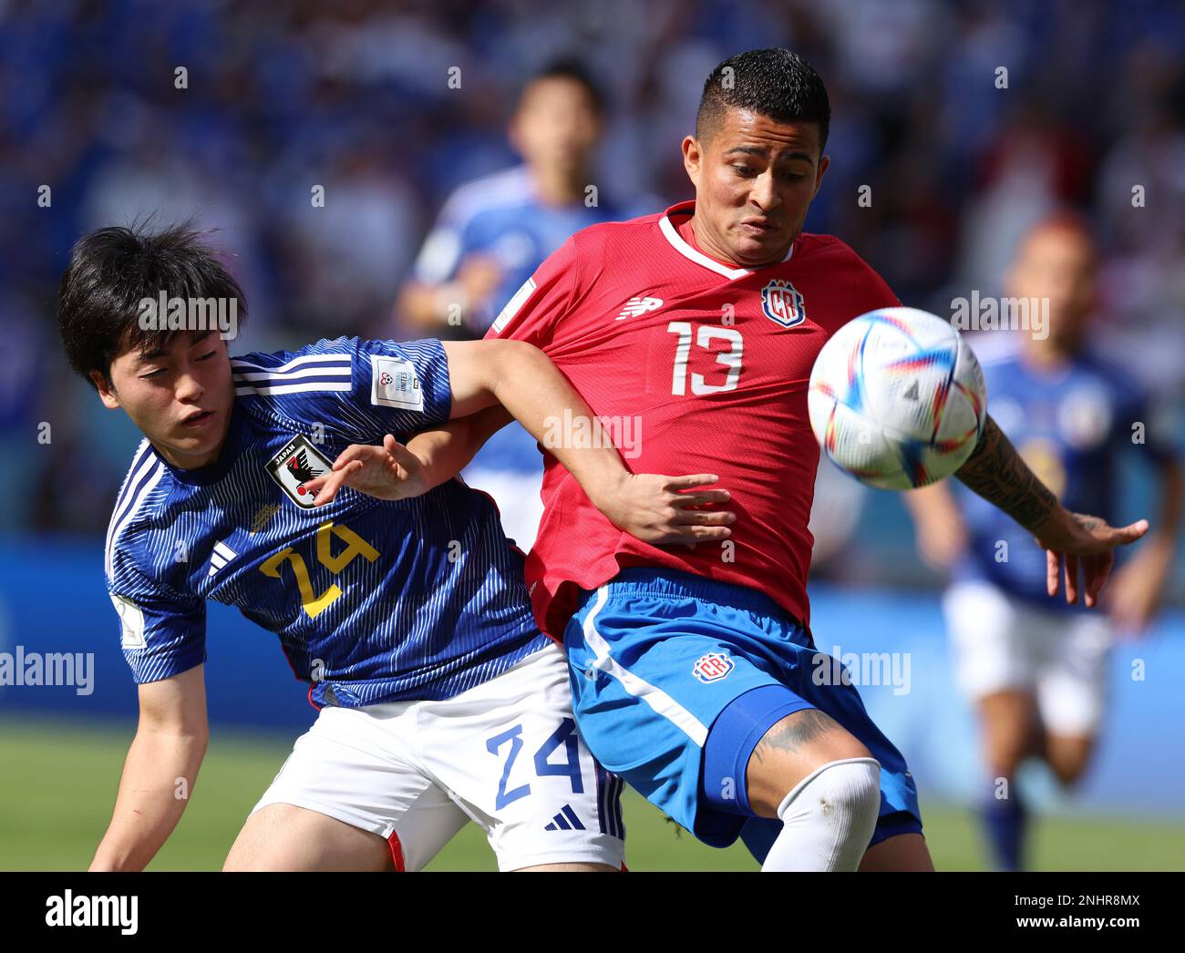 Costa Rica's Gerson Torres (R) vies for the ball with Japan's Yuki Soma ...
