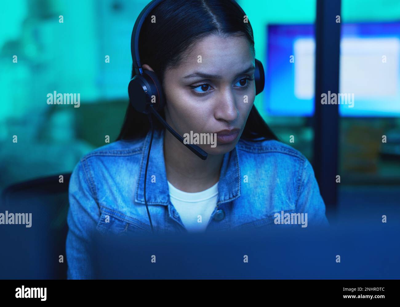 Serious woman, computer or headphones in neon home for iot coding ...
