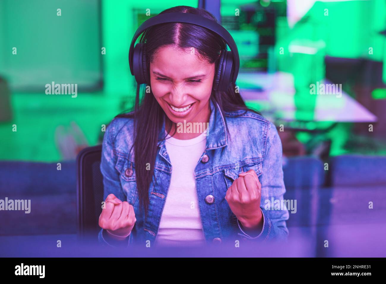 Headphones Success And Celebration Of Hacker On Computer After Hacking Software Database Night