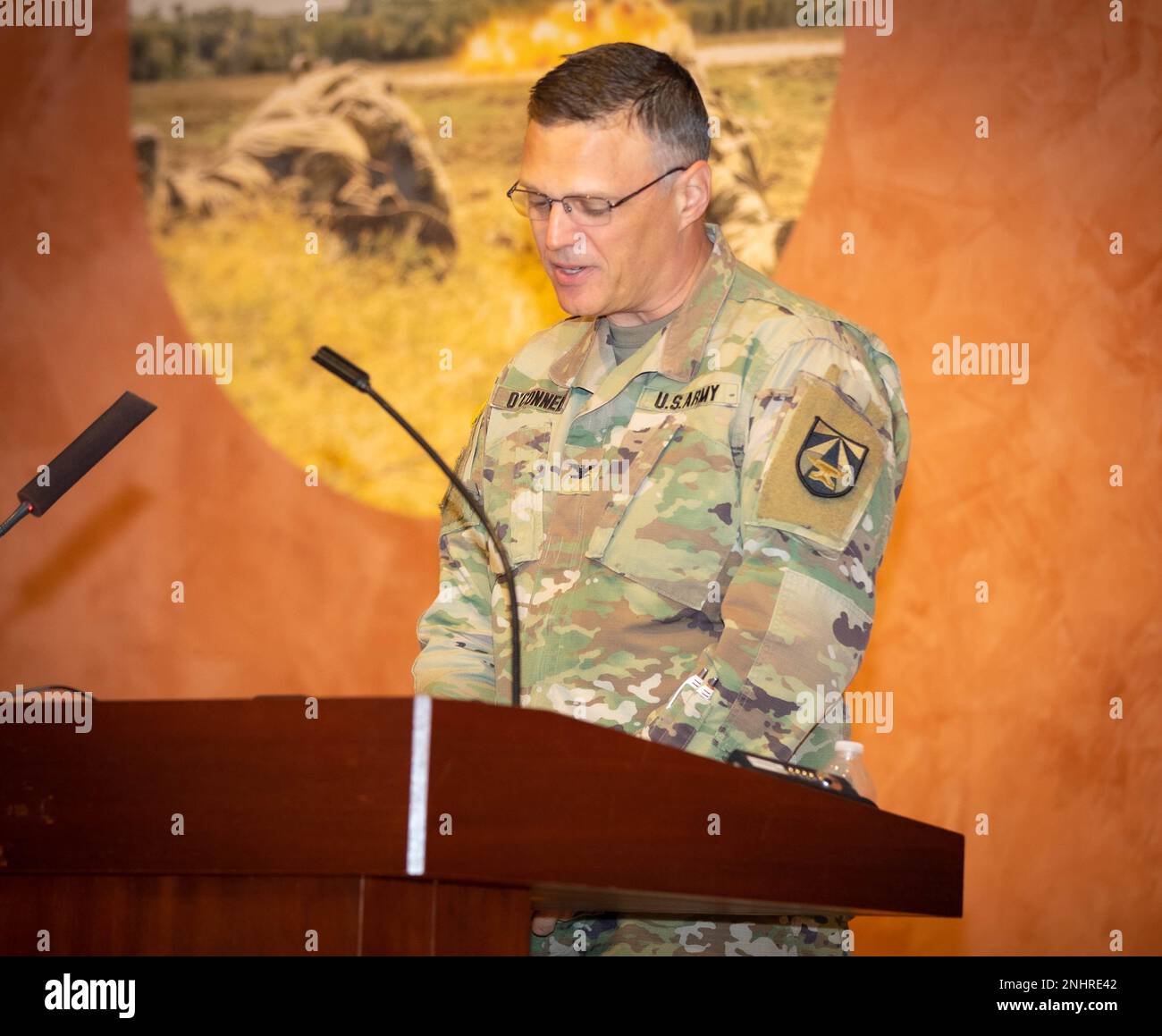 COL Robert J O'Connell saying a prayer at the HHC Assumption of ...