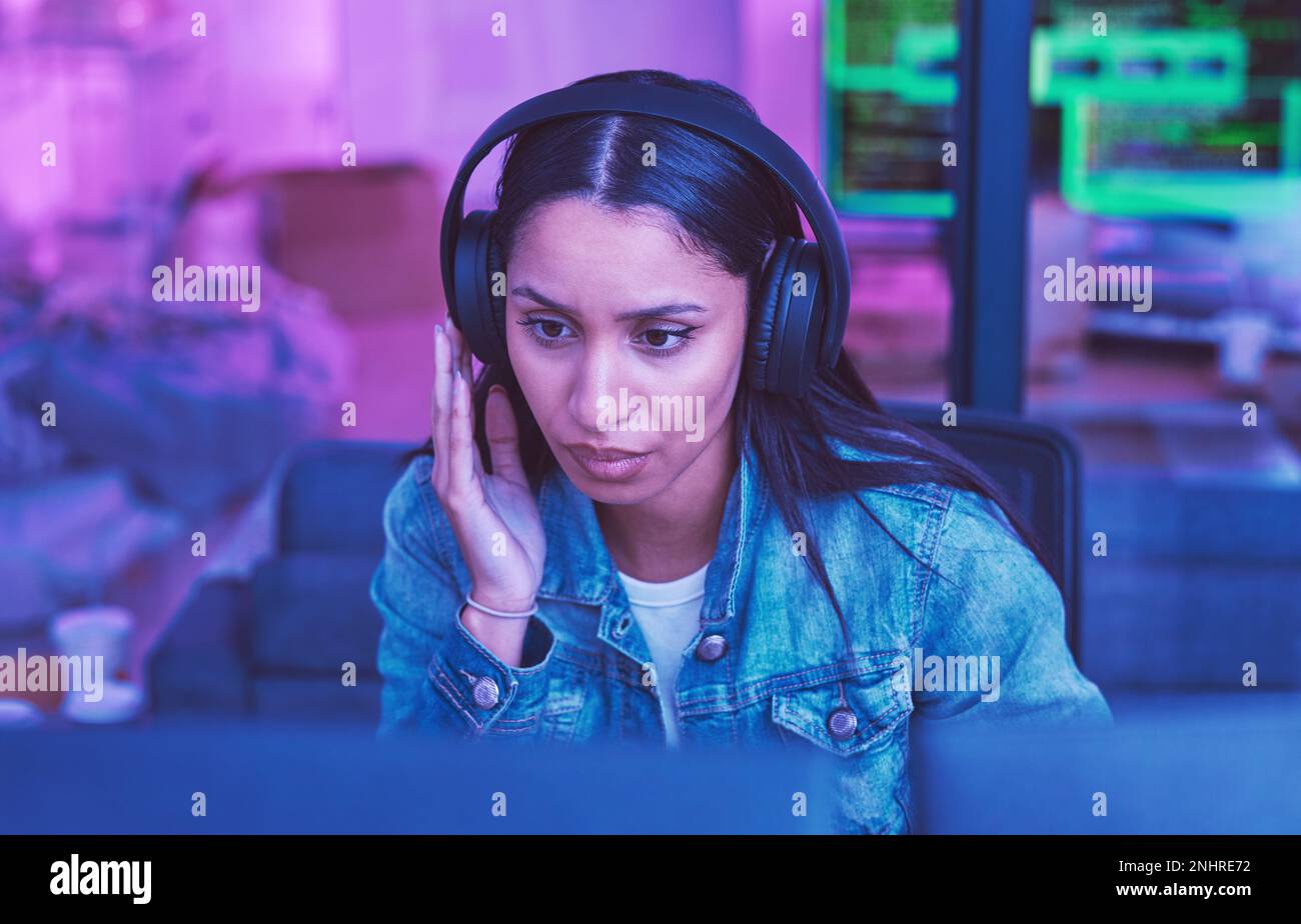 Developer, computer or headphones in neon coding for cybersecurity iot, night SEO thinking or ...