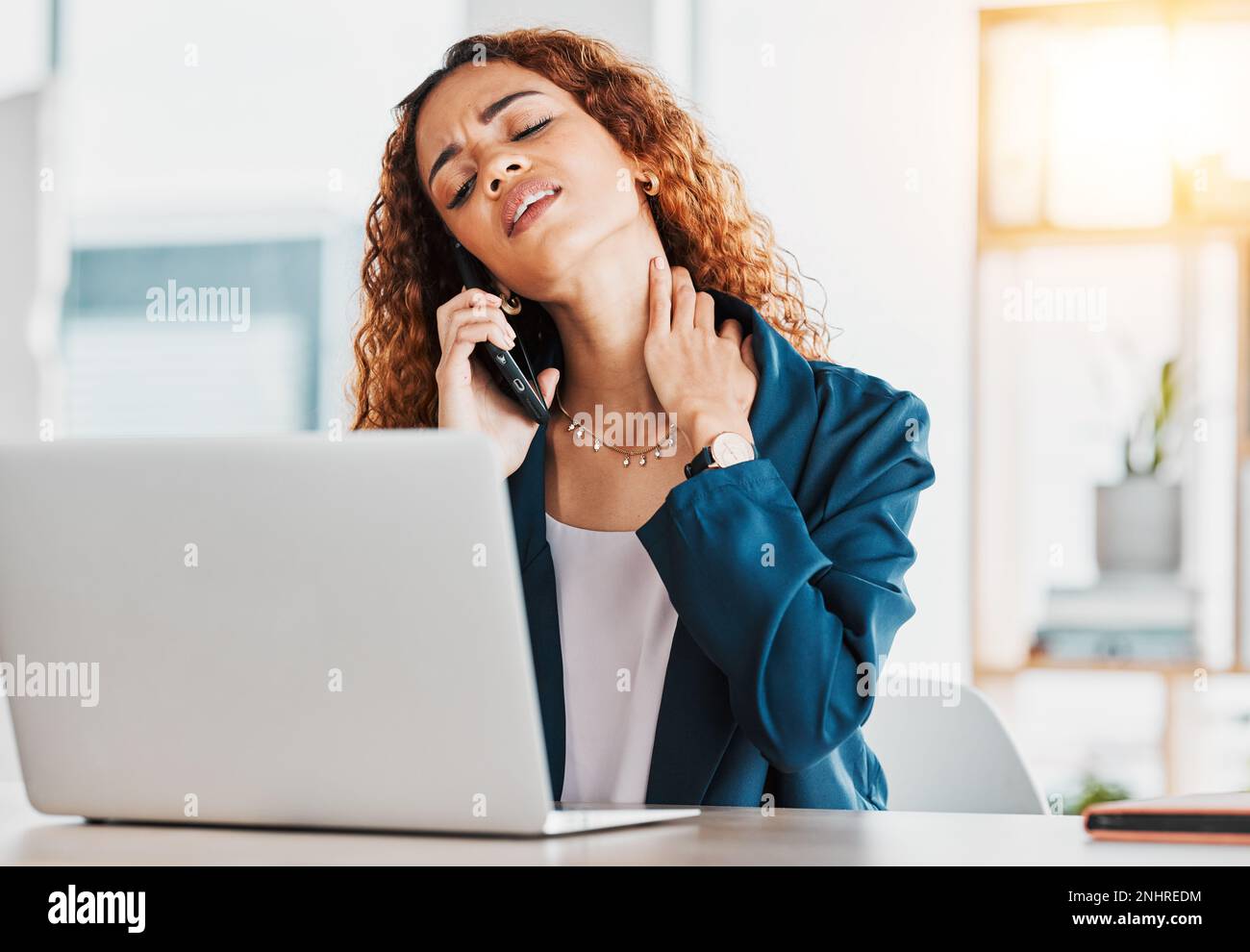 Business, phone call and black woman with neck pain, laptop and burnout ...