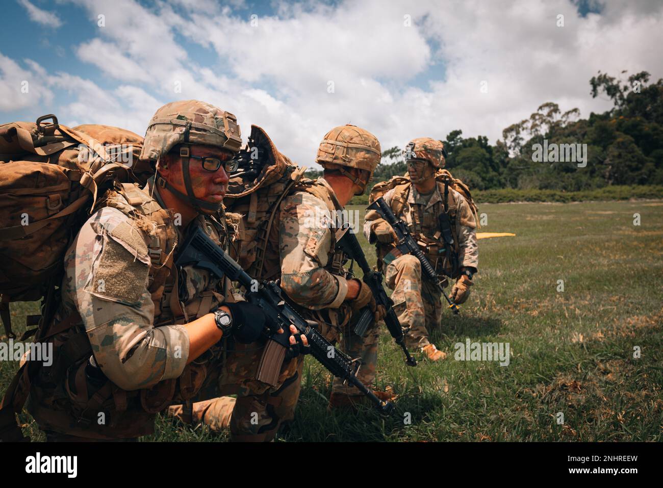 U.S. Soldiers attending the Small Unit Ranger Tactics course group up ...
