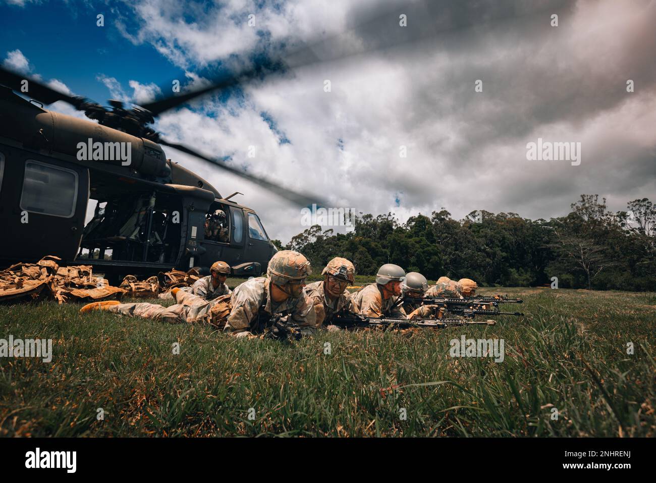 U.S. Soldiers attending the Small Unit Ranger Tactics course offload ...