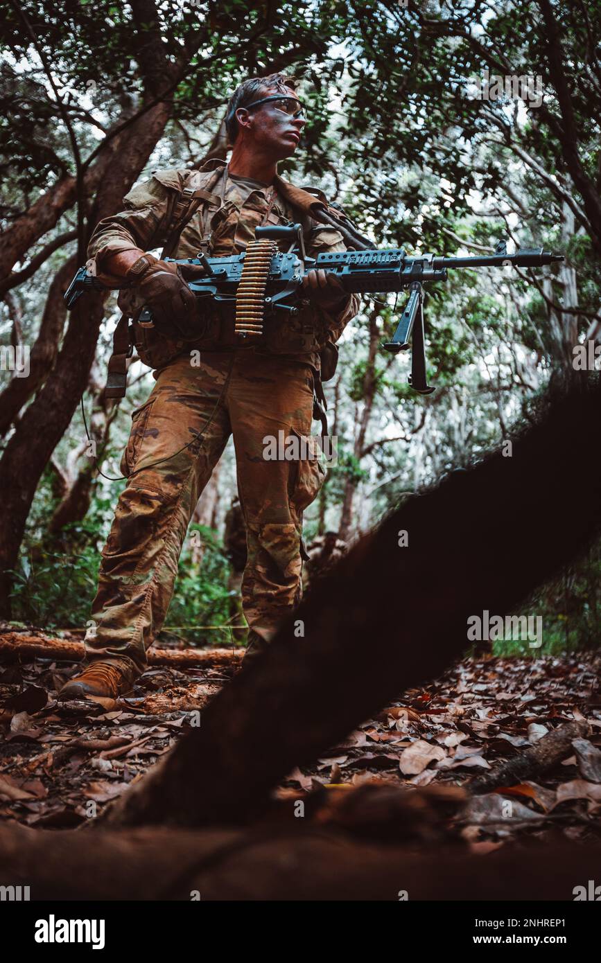 U.S. Soldier attending the Small Unit Ranger Tactics course surveys the ...