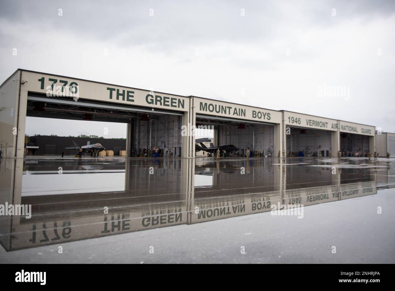 Airmen, friends, and family members of the 158th Fighter Wing welcome ...
