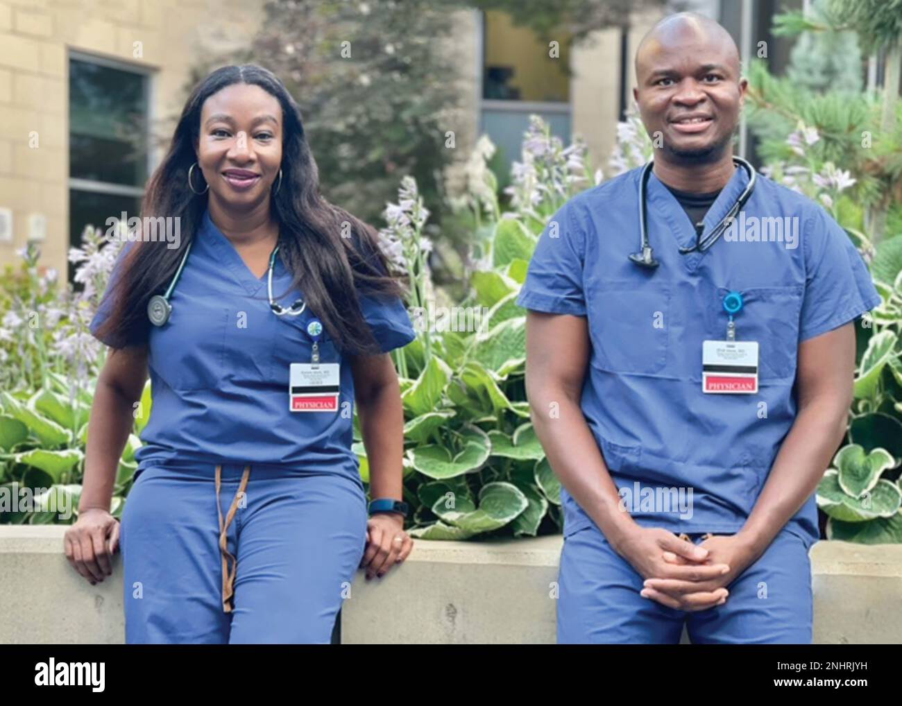 U.S Air Force Majs. Emem Idem and Ifiok Idem pose in their civilian ...