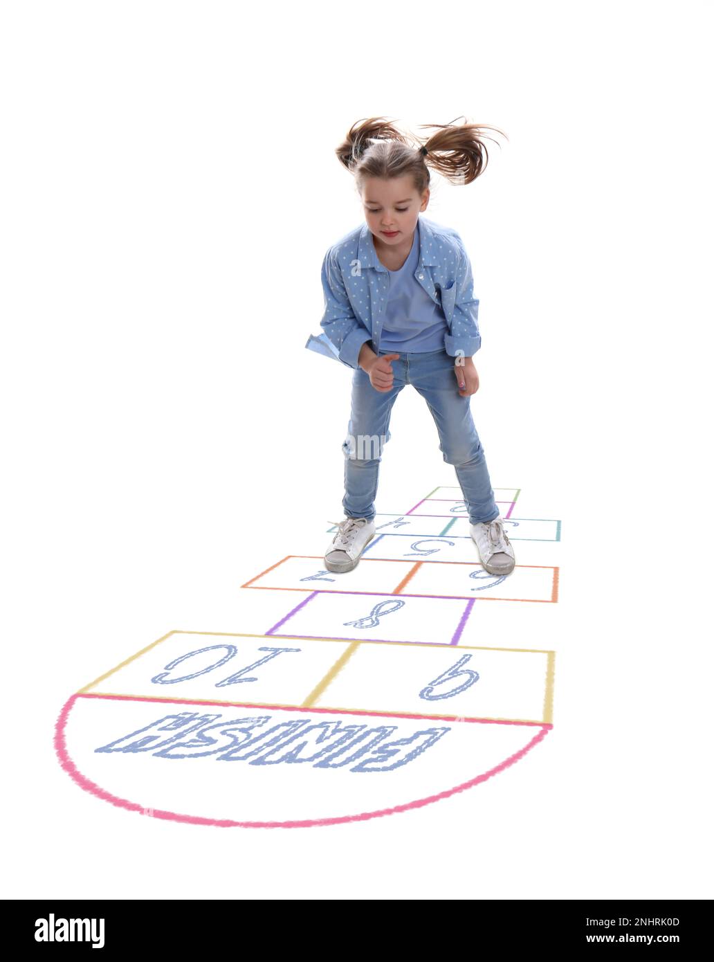 Cute little girl playing hopscotch on white background Stock Photo - Alamy