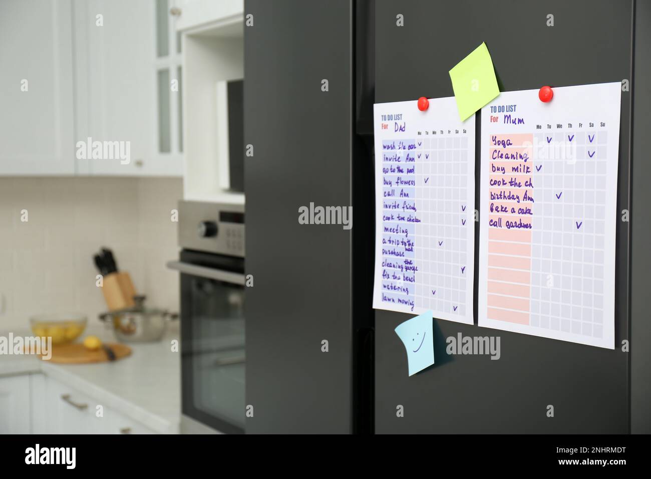 To do lists and sticky notes on fridge in kitchen. Space for text Stock ...
