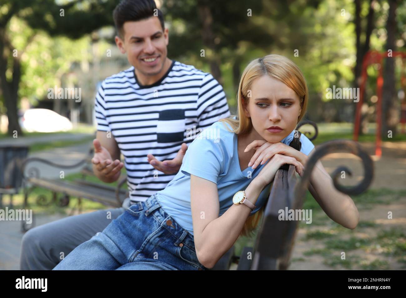 Young woman getting bored during first date with overtalkative man in ...