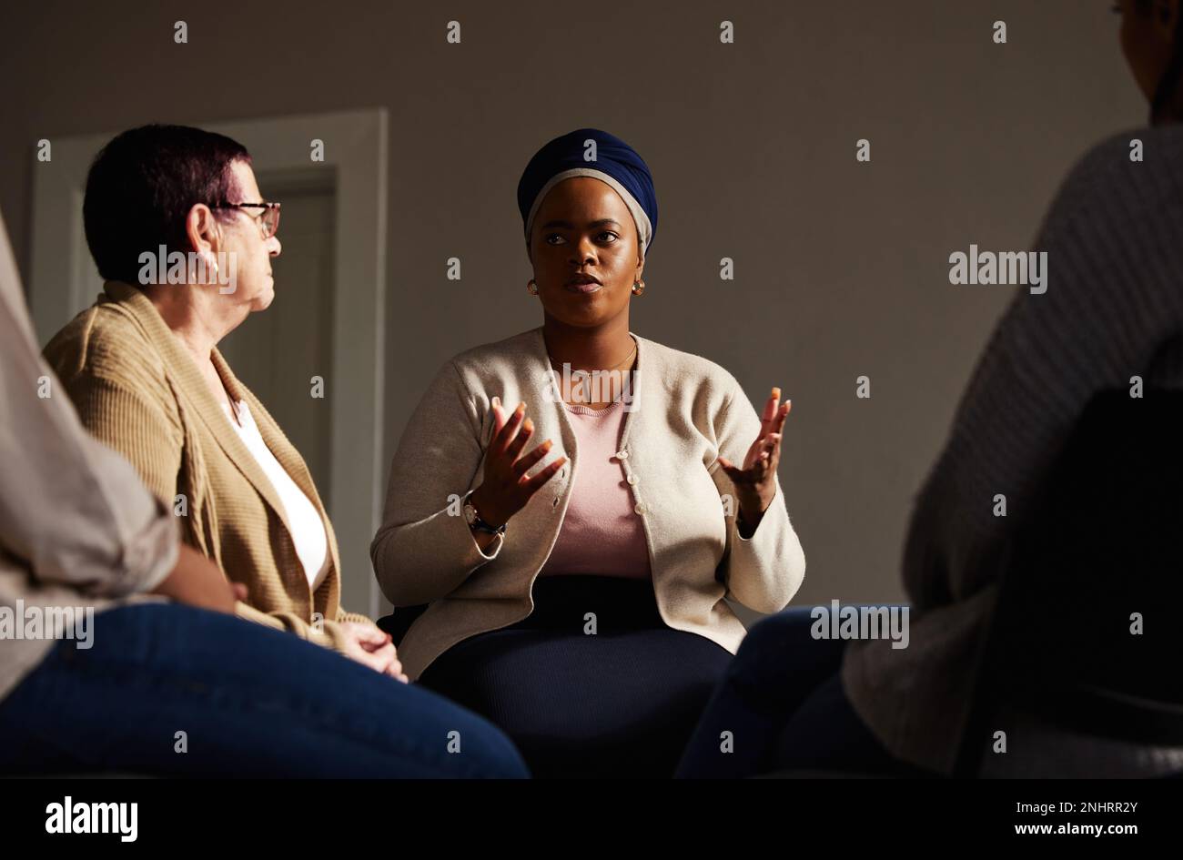 Support, black woman and senior group therapy with understanding ...
