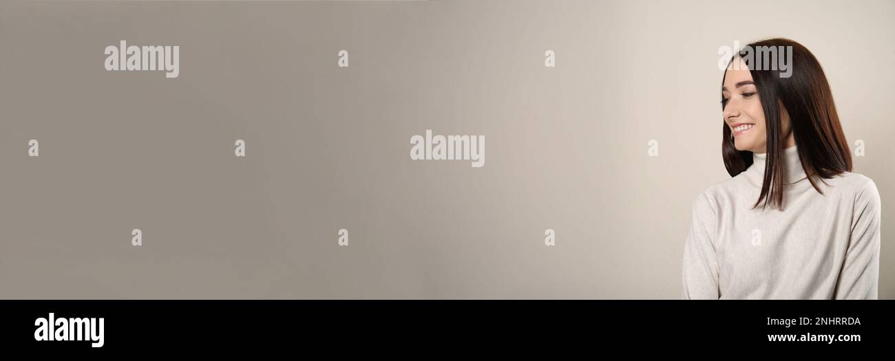 Portrait of pretty young woman with gorgeous chestnut hair and charming ...