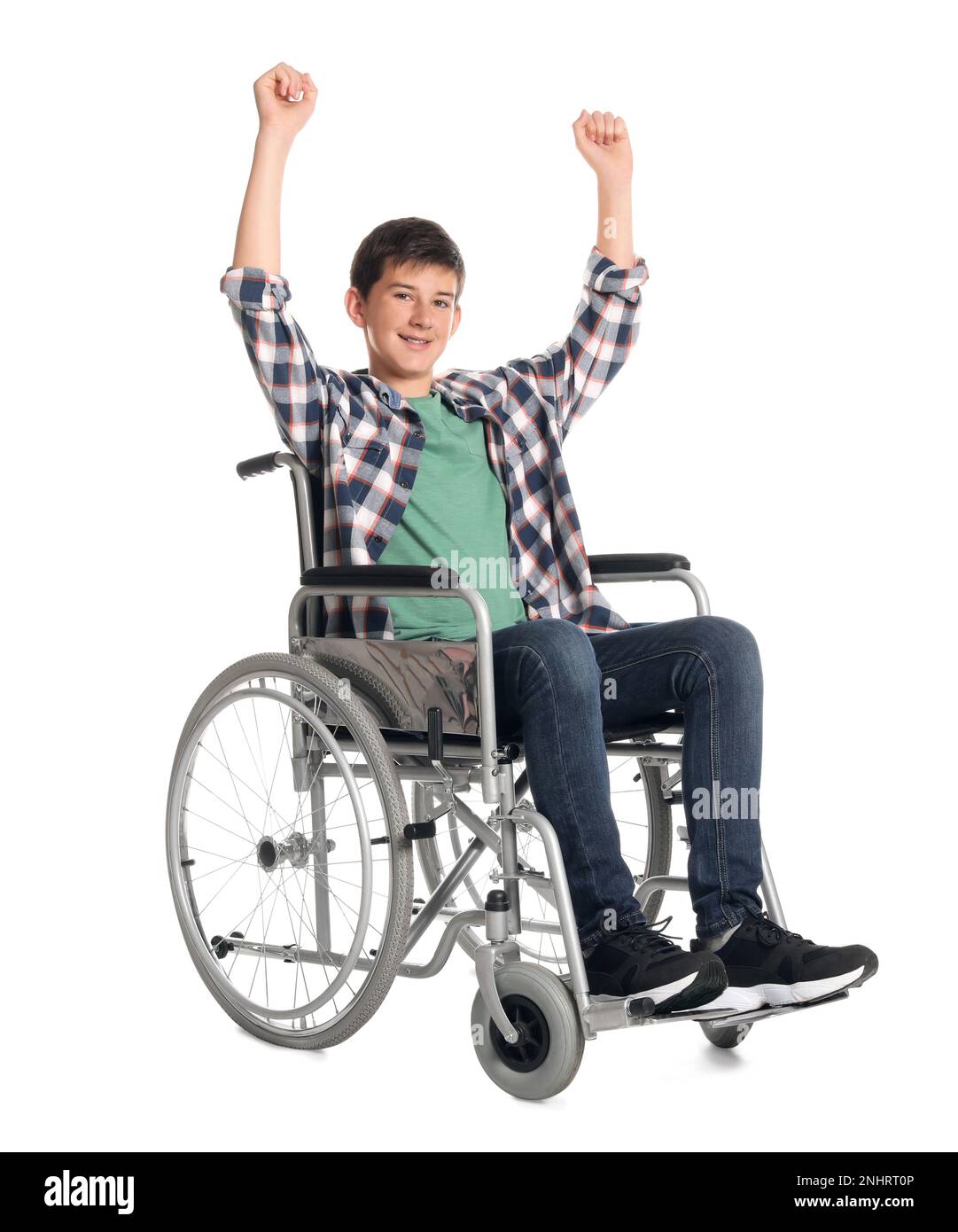 Teenage boy in wheelchair on white background Stock Photo - Alamy