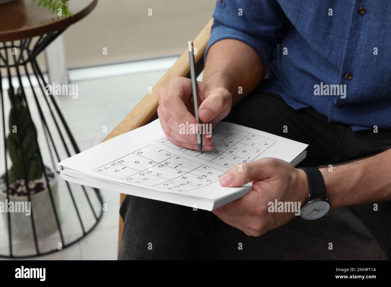 Man solving hi-res stock photography and images - Alamy
