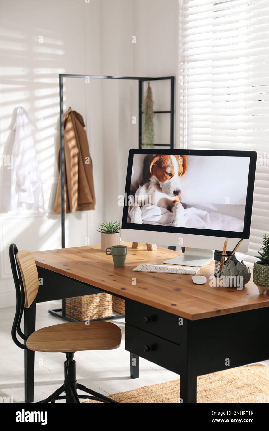 Stylish home office interior with comfortable workplace Stock Photo - Alamy