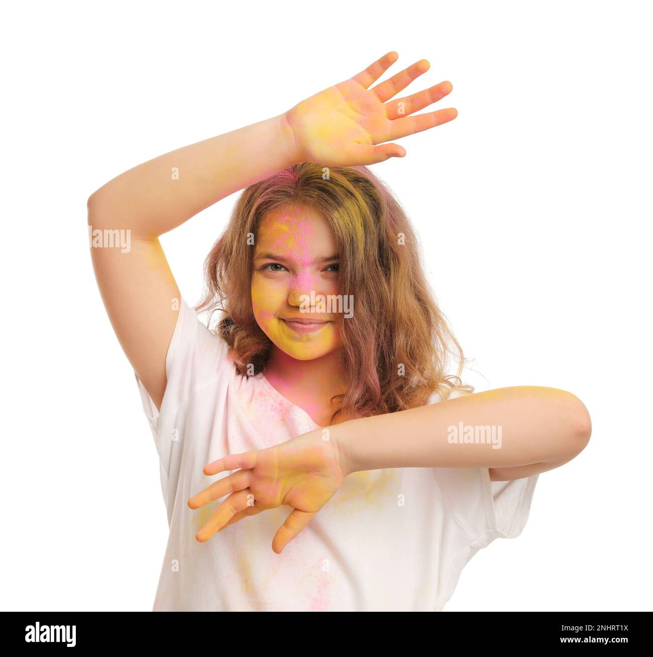 Teen girl covered with colorful powder dyes on white background. Holi ...