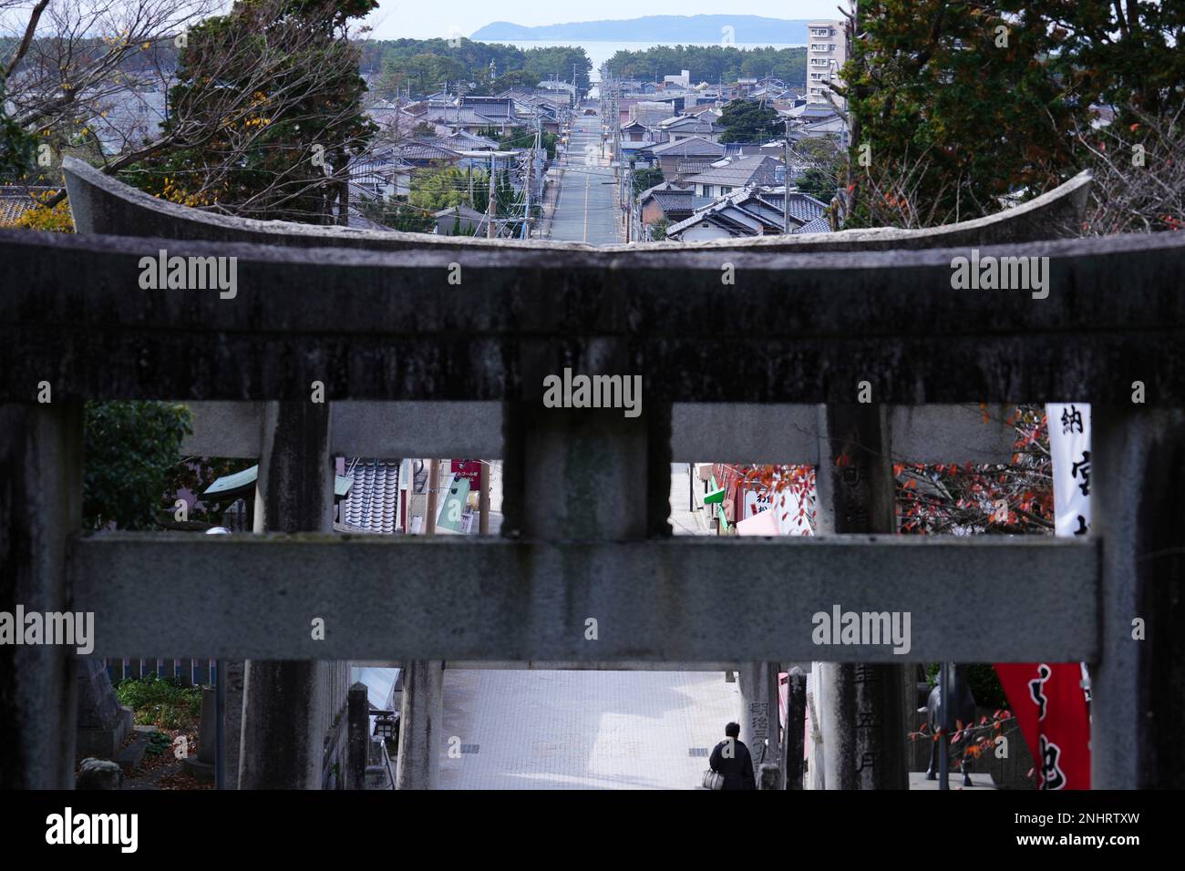 A road connects Miyajidake Jinja Shrine and the sea in Fukutsu City ...