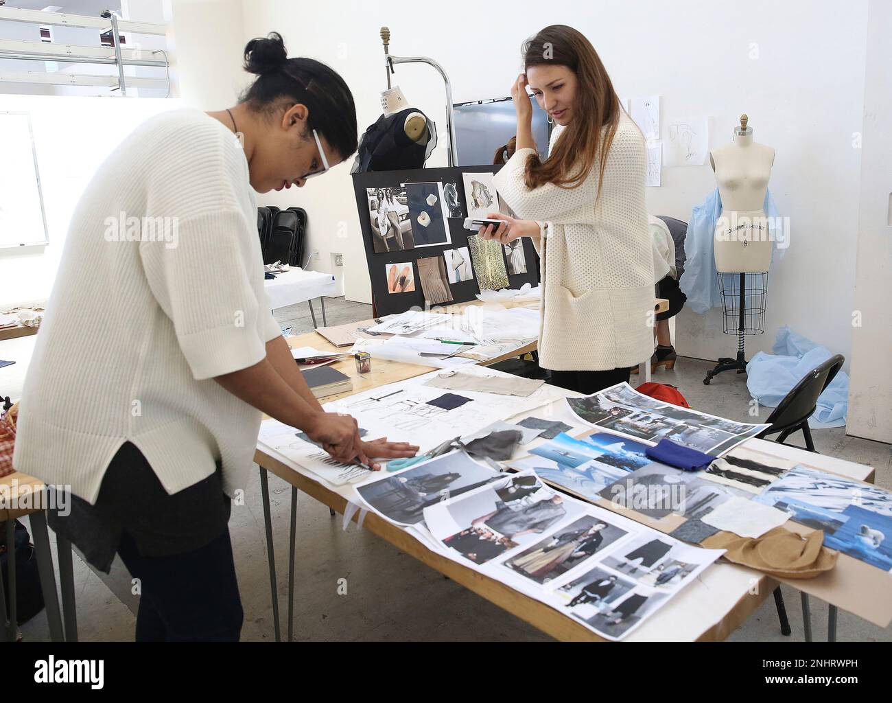 Junior design students Sophia Lemos (right) and Nicole Adames (left ...