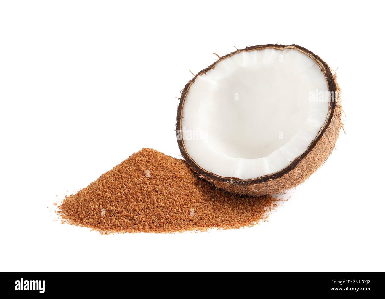 Ripe coconut and pile of brown sugar on white background Stock Photo ...