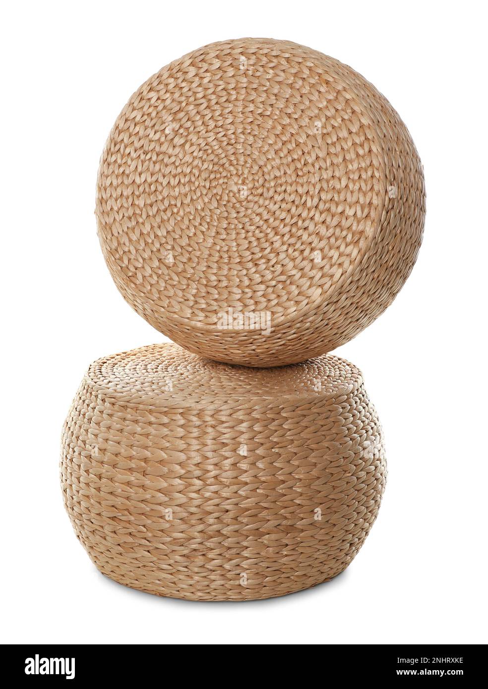 Two stylish wicker poufs on white background Stock Photo - Alamy
