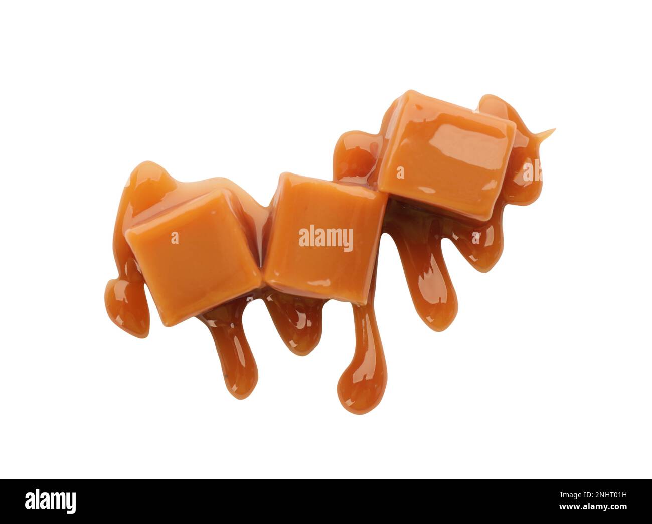 Caramel candies with topping on white background, top view Stock Photo ...