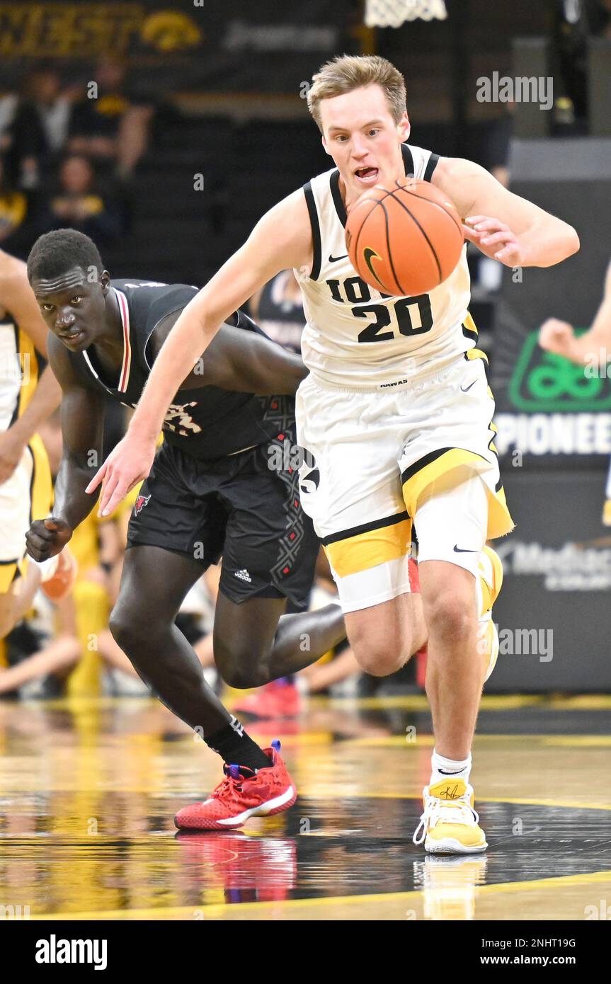 IOWA CITY, IA - NOVEMBER 21: Iowa guard Payton Sandfort (20) brings the ...