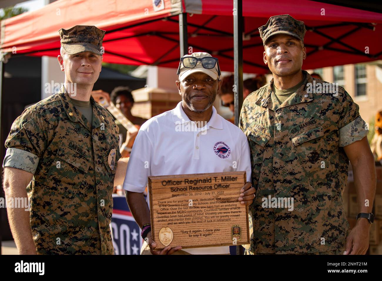 From left, U.S. Marine Corps Maj. Matthew E. Carwile, provost marshal ...