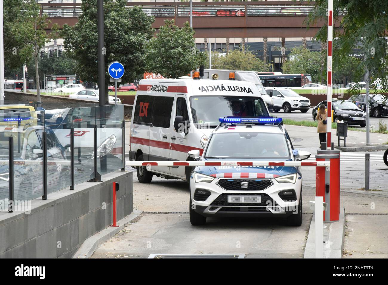 A police car and an ambulance on arrival at the City of Justice for the ...