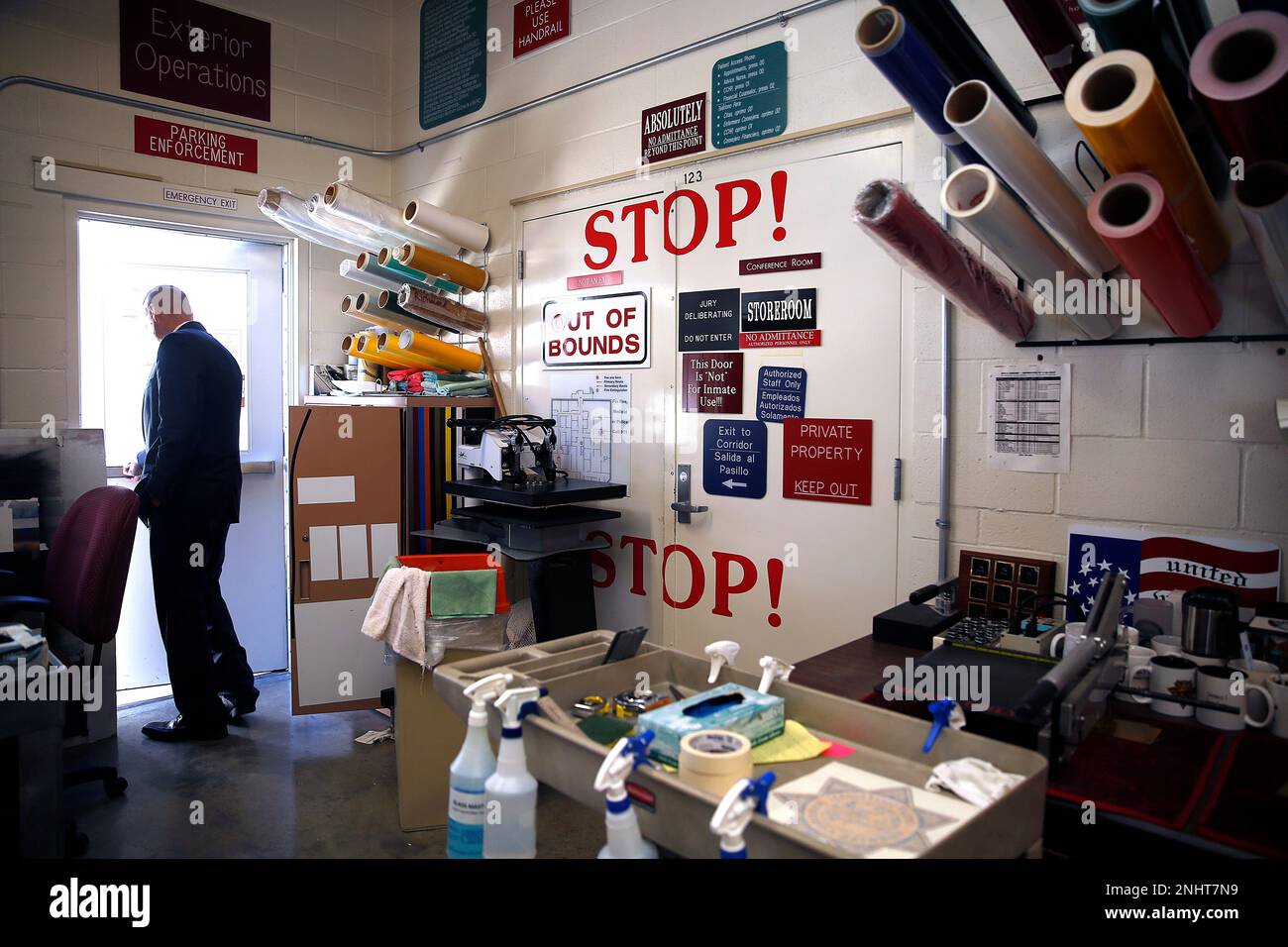Captain Tom Chalk shows the engraving shop at the West County Detention ...