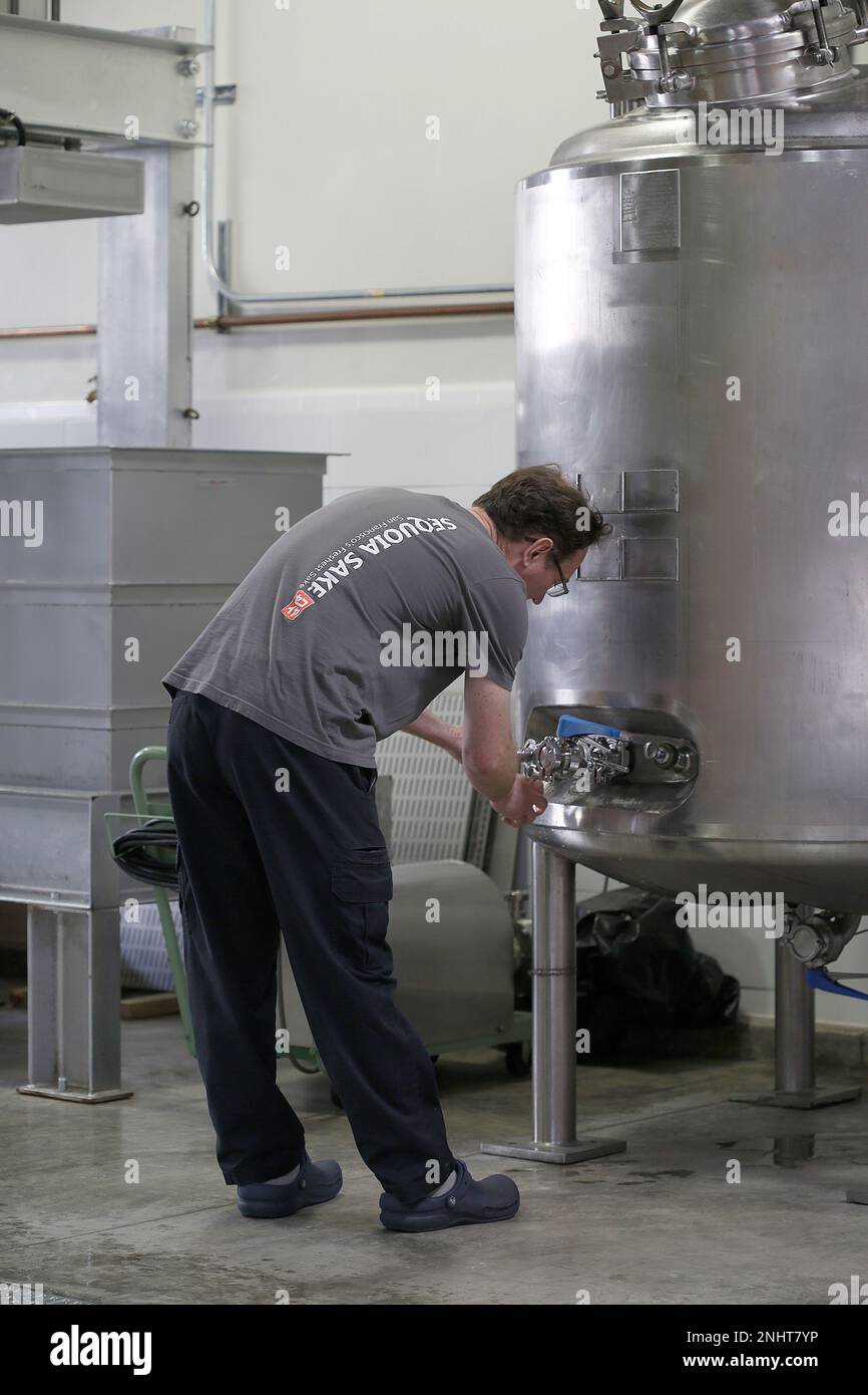 Sequoia Sake partner Jake Myrick gets a sake sample at his production ...