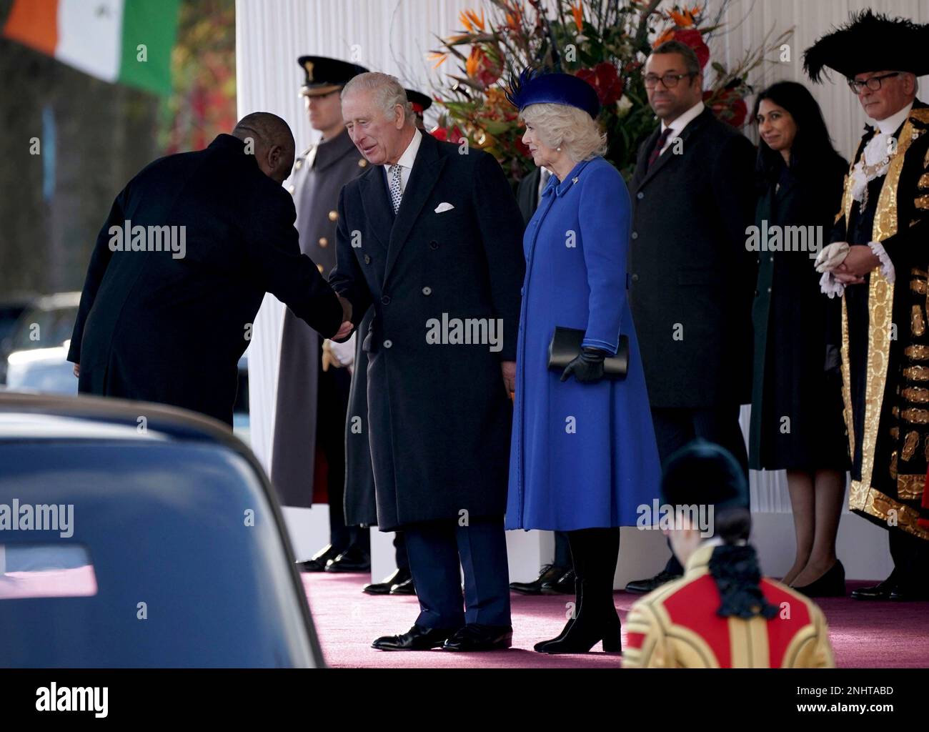 President Cyril Ramaphosa of South Africa shakes hands with Britain's King Charles III as ...