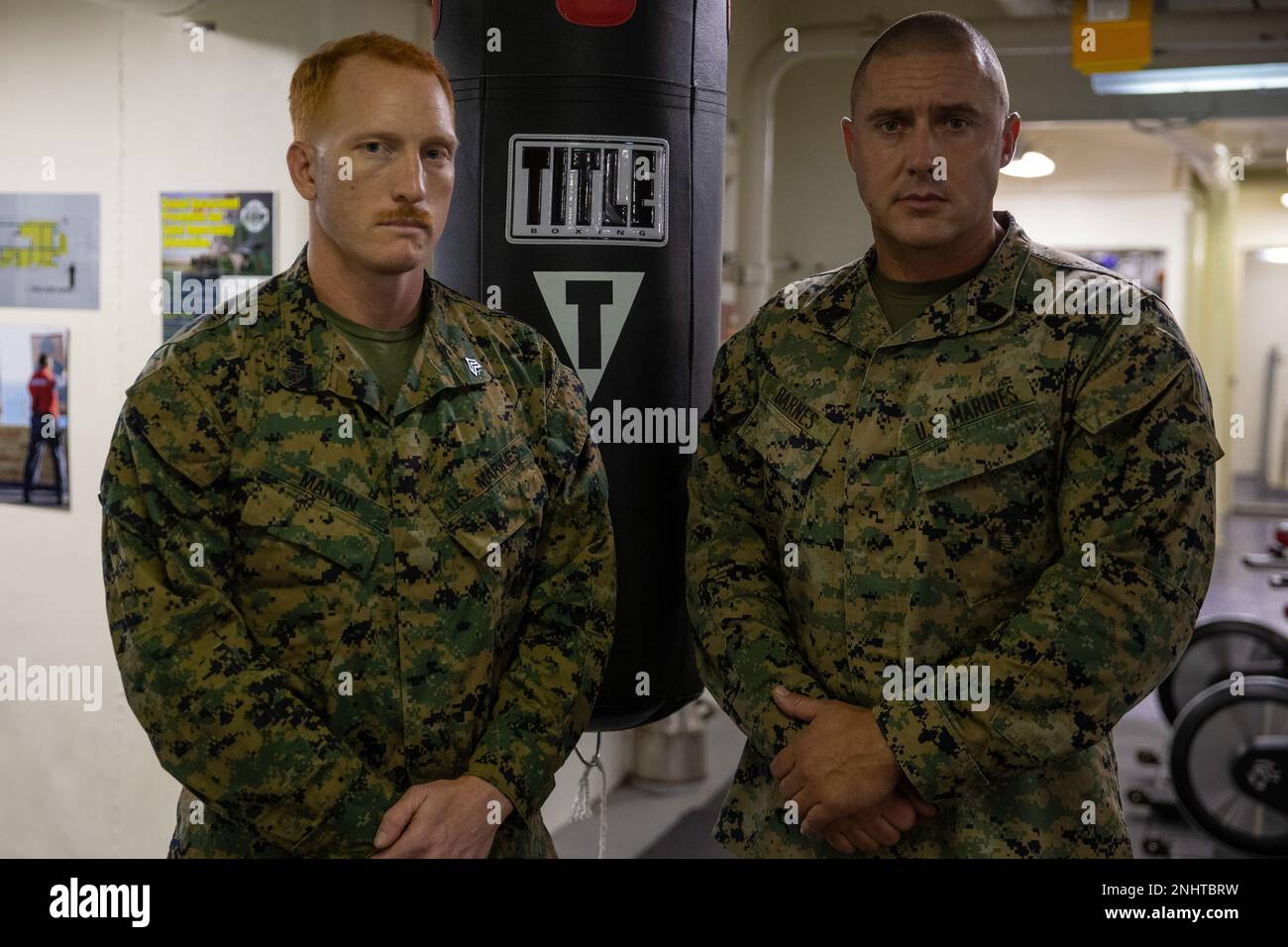 U.S. Marine Corps 1st. Sgt. Travis Barnes and newly promoted Sgt ...