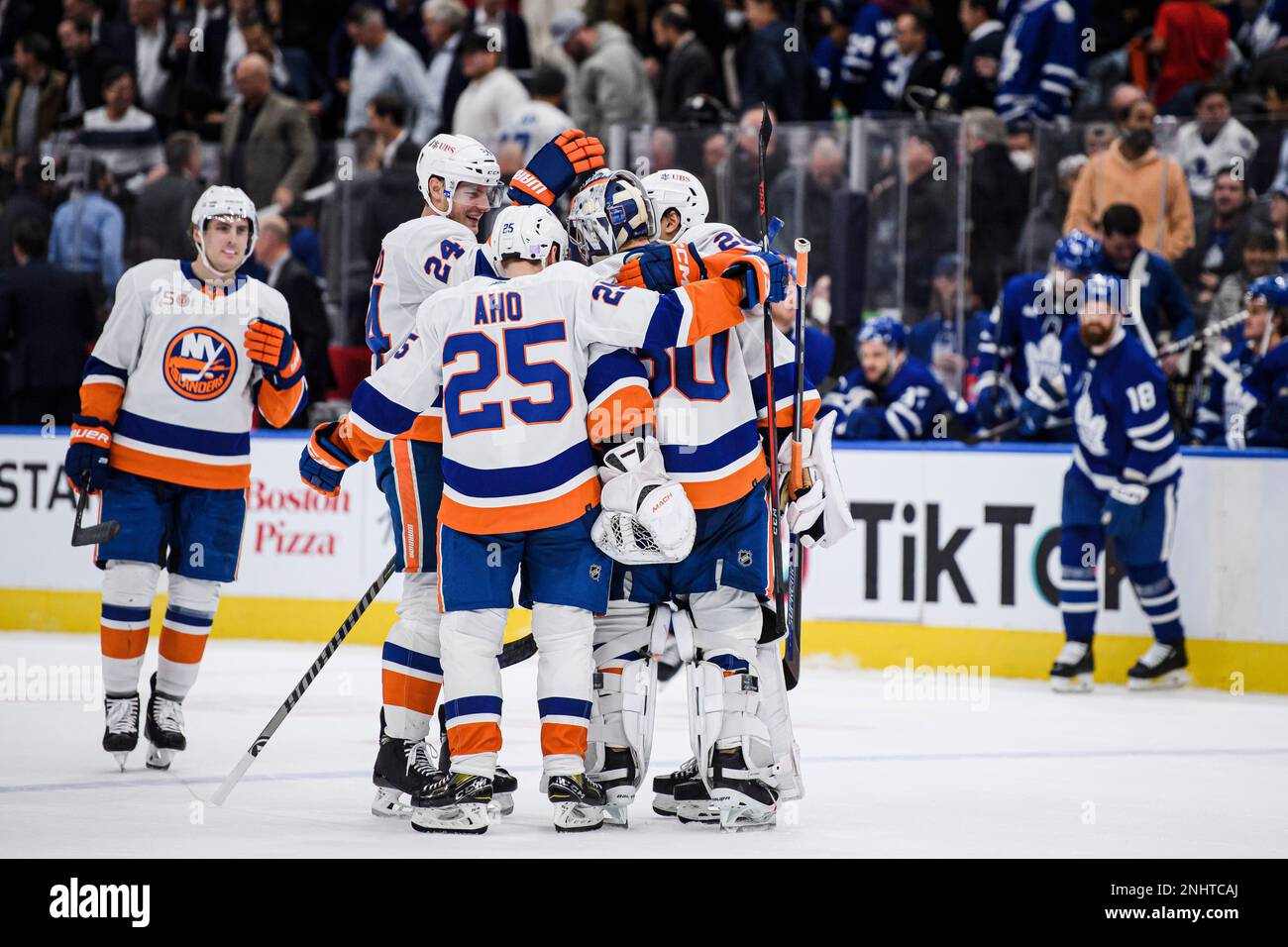 The New York Islanders celebrate after defeating the Toronto Maple ...