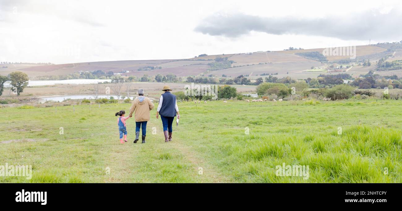 Agriculture, field in countryside with family walking on farm and back ...