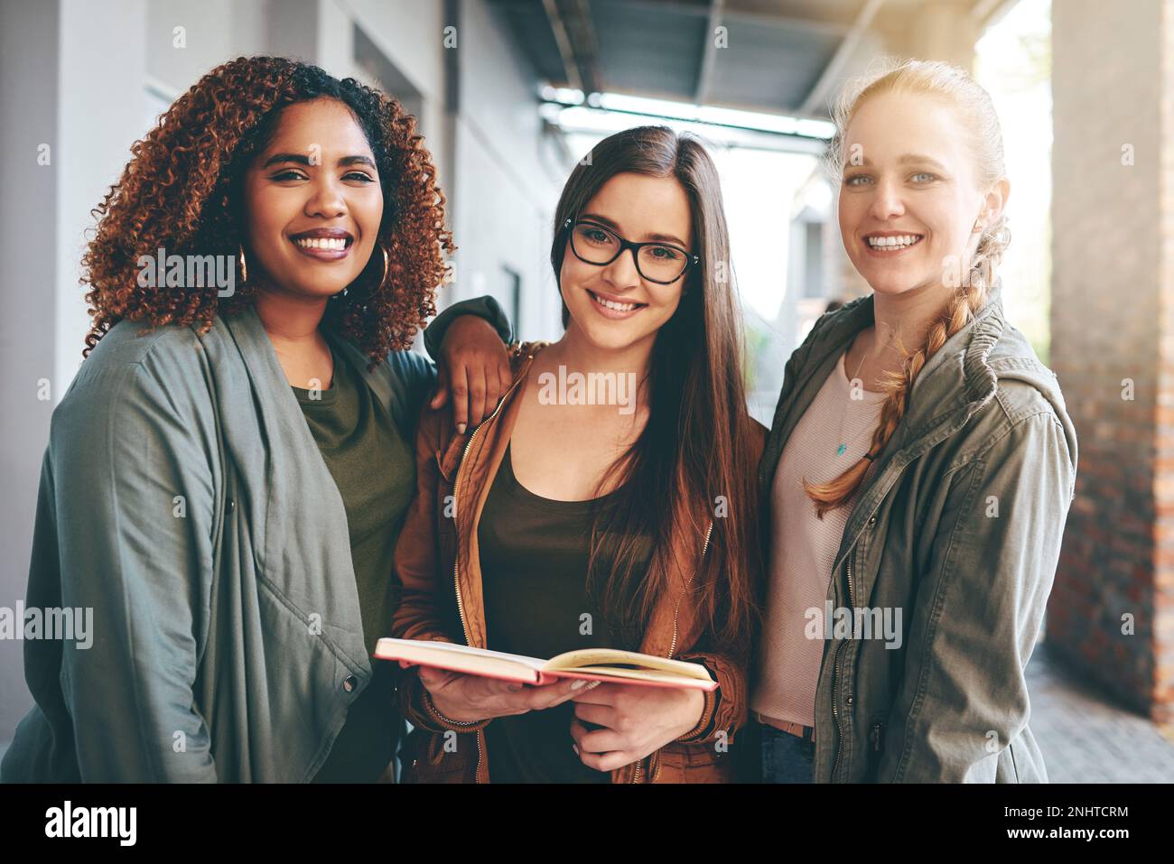Friends make the best study buddies. Portrait of a group of young ...